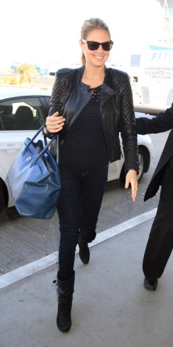Kate Upton Uses a Chanel Cerf Tote as a Carry-On - PurseBlog