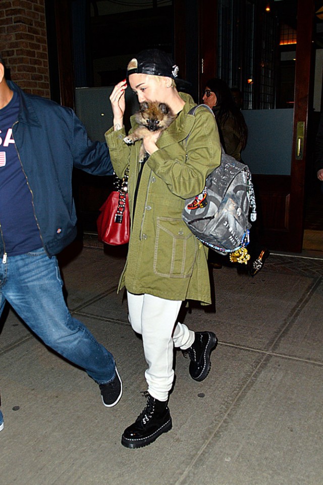 Miley Cyrus Carries The Infamous Chanel Graffiti Backpack | PurseBlog