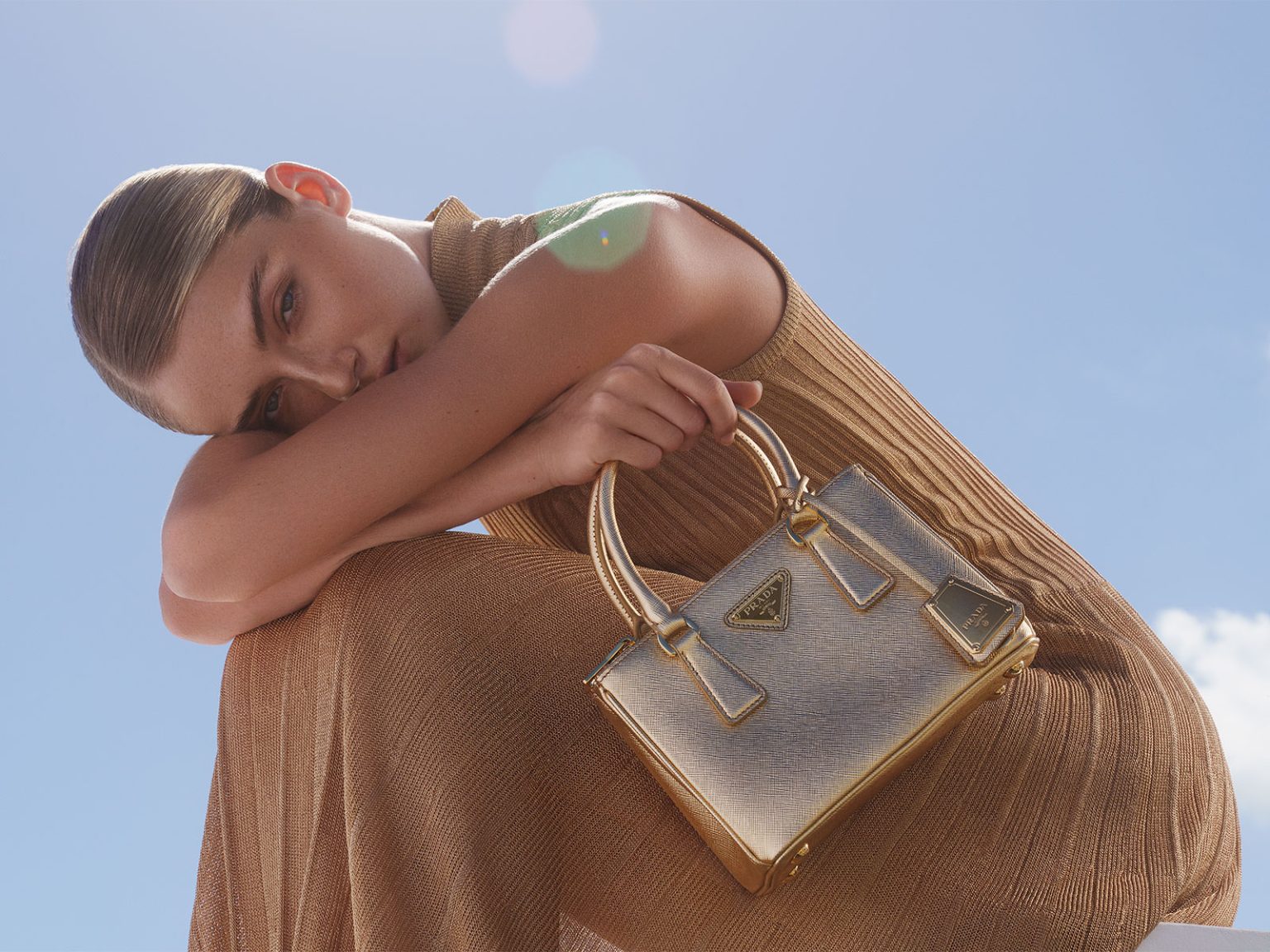 All that Glitters is Gold for Prada Holiday - PurseBlog