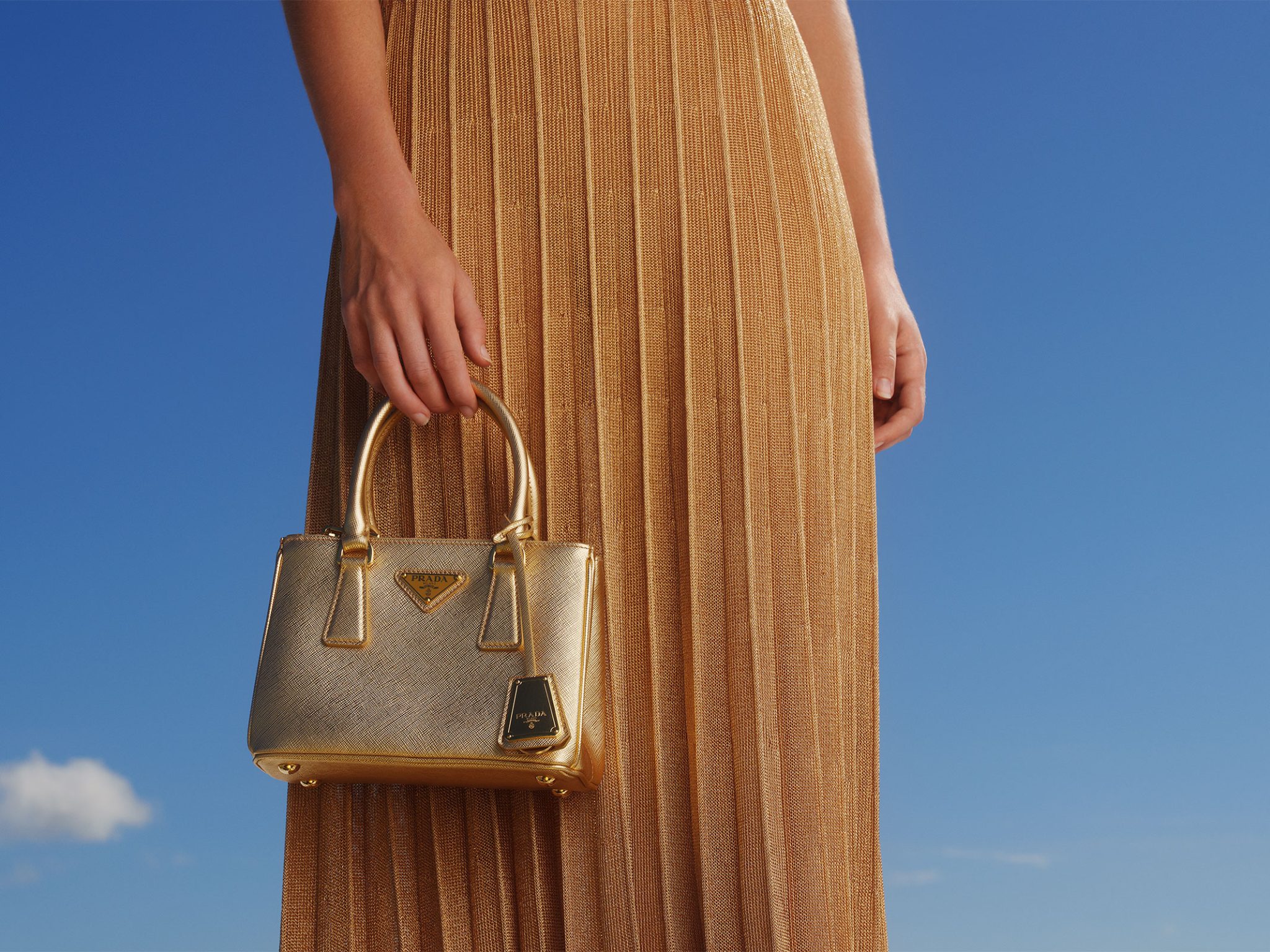 All that Glitters is Gold for Prada Holiday - PurseBlog