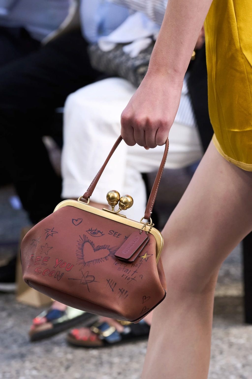 Kiss Locks and Big Bags Ruled the Coach Spring 2025 Runway - PurseBlog